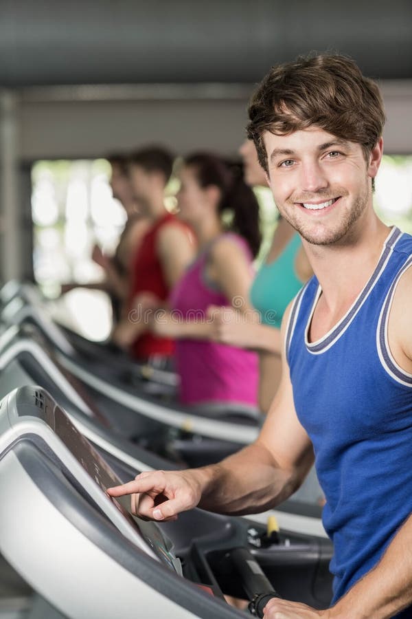 Smiling Muscular Man on Treadmill Stock Image - Image of slender ...
