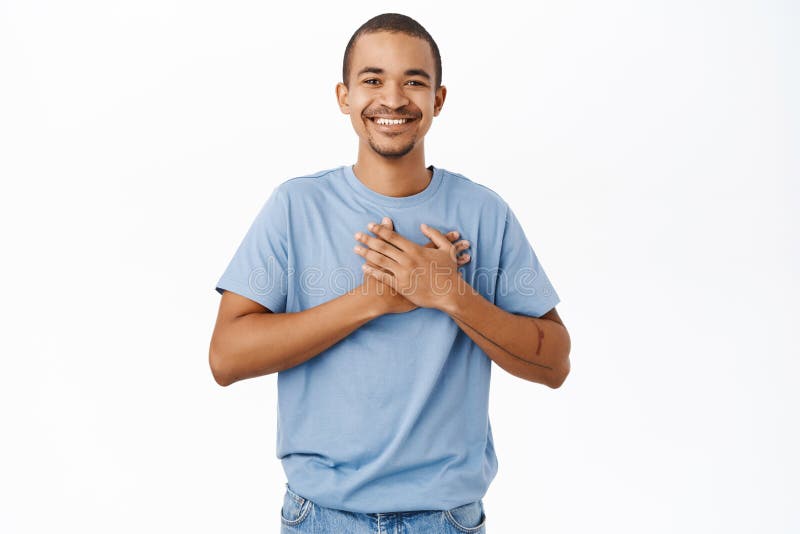 Smiling Nice Guy Holds Hands on Heart, Heartwarming and Caring Feeling ...