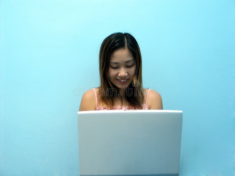 Smiling with a Notebook stock image. Image of computer, smiling - 47025