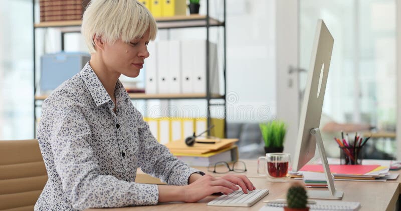 Smiling Office Worker Types on Computer Keyboard in Office Stock Video ...