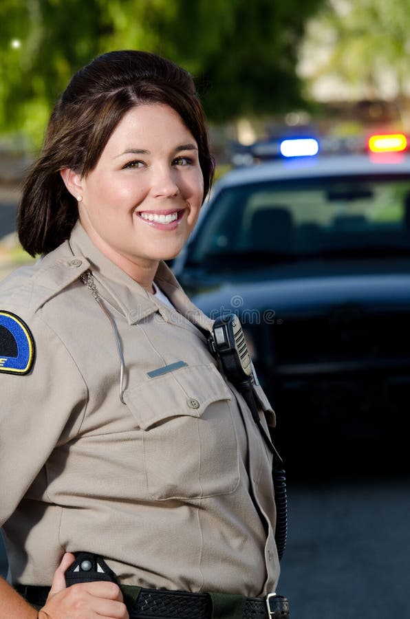 Smiling officer stock image. Image of grin, pretty, policewoman - 26795603