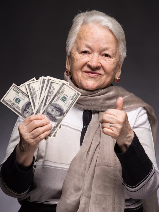 170 Smiling Old Woman Holding Money White Background Stock Photos ...