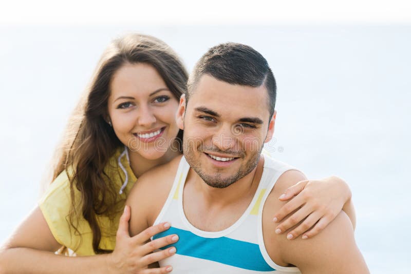 Smiling Pair Having Romantic Date on Sandy Beach Stock Photo - Image of ...