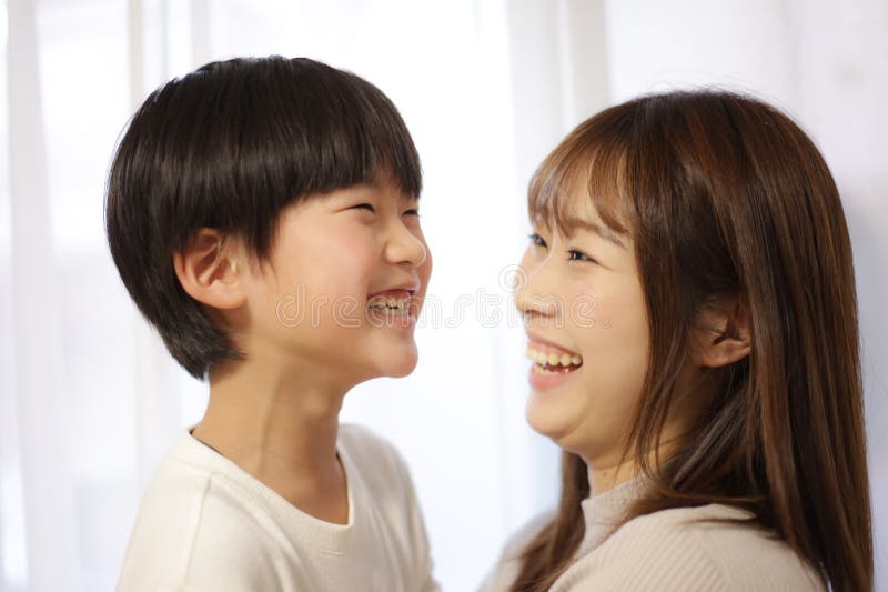 Smiling Parents and Children Stock Photo - Image of asia, health: 324842700