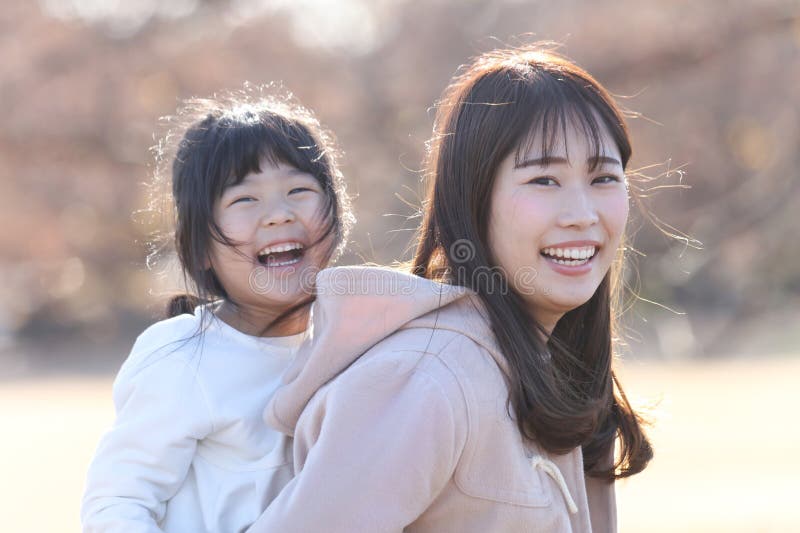 Smiling Parents and Children Stock Photo - Image of girl, people: 344483748