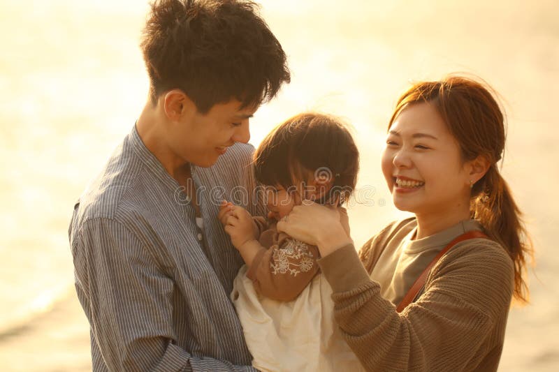 Smiling Parents and Children Stock Photo - Image of girl, outdoors ...