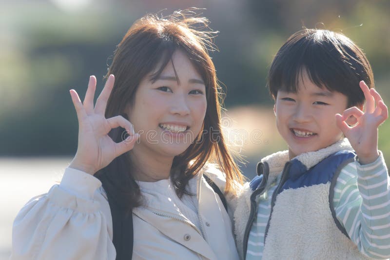Smiling Parents and Children Stock Photo - Image of leaves, happy: 324704256