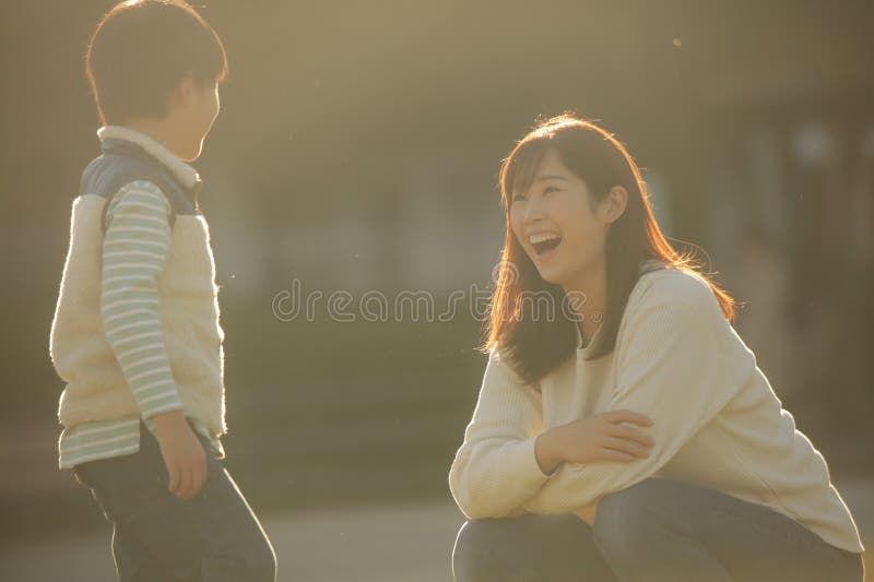 Smiling Parents and Children Stock Photo - Image of playing, parent ...