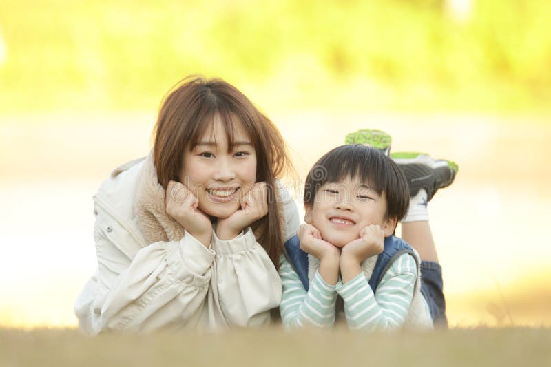 Smiling Parents and Children Stock Image - Image of family, cute: 324704453