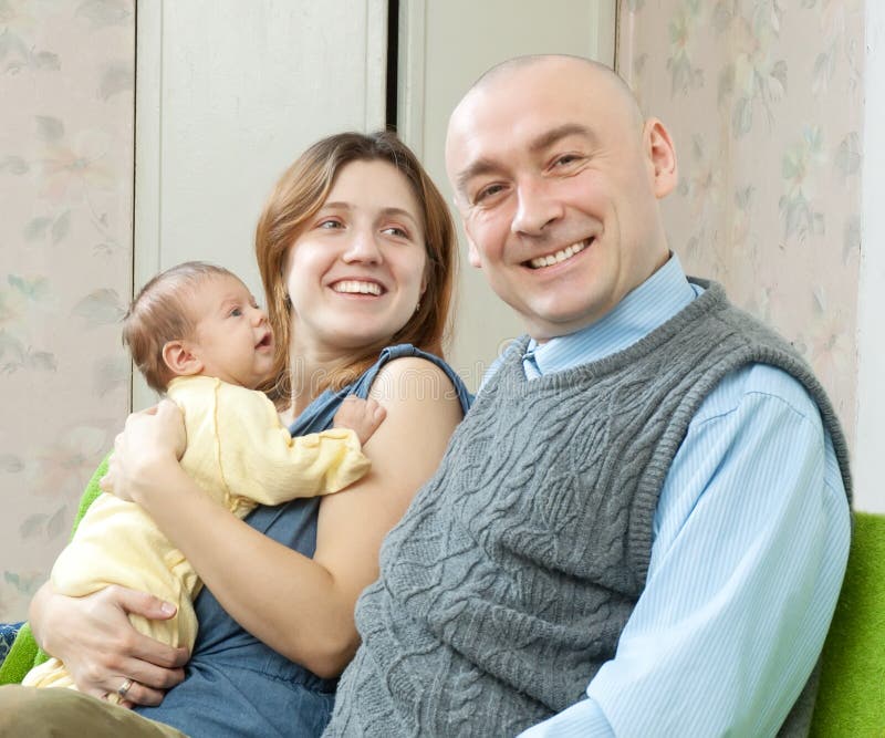 Smiling Parents Helping with Homework Stock Image - Image of people ...