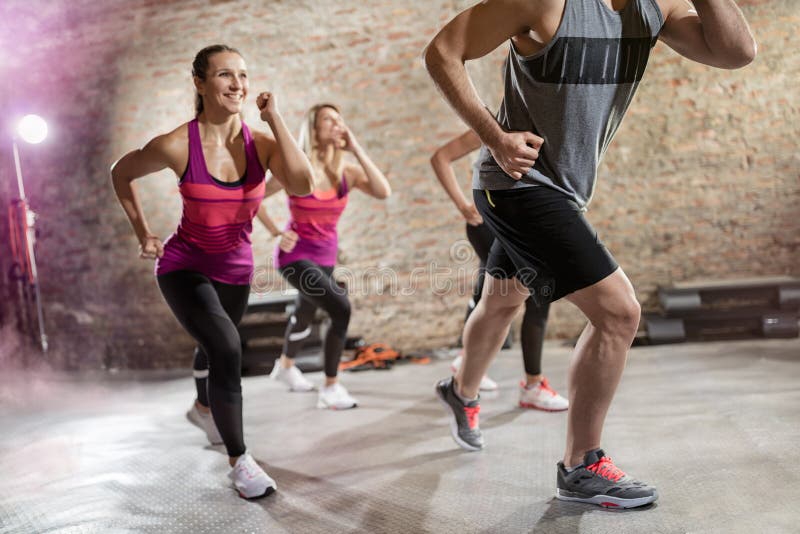 Smiling people exercising stock photo. Image of resistance - 69806600