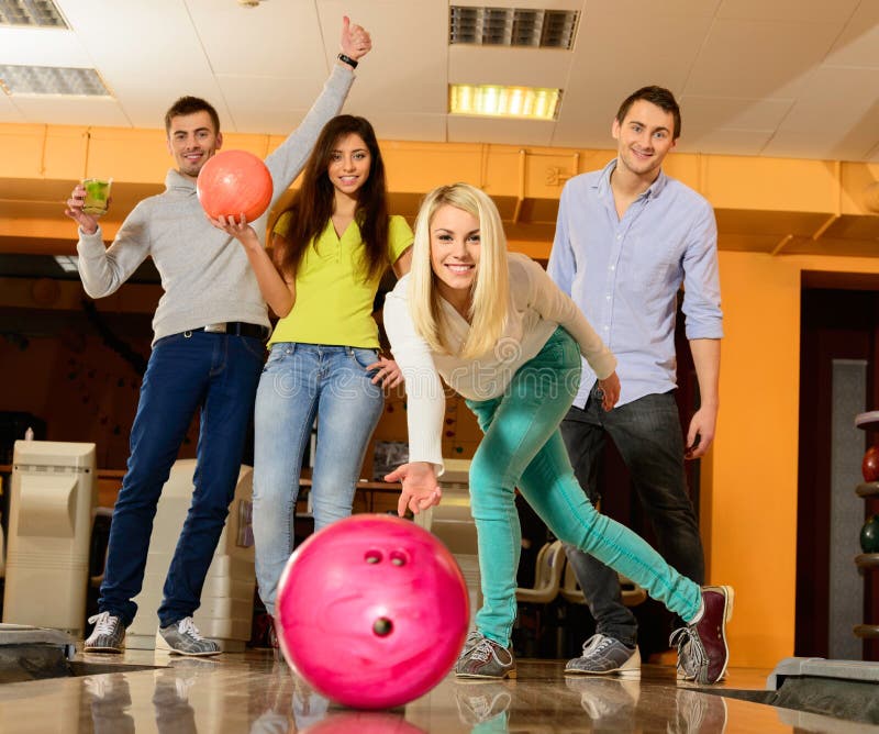 Smiling People Playing Bowling Stock Photo - Image of ball, game: 38477290