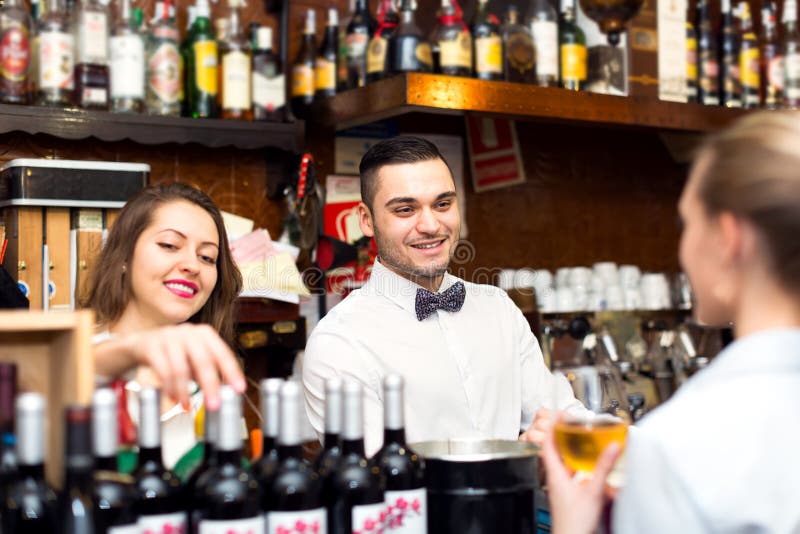 Smiling People Working in a Bar Stock Image - Image of european, male ...
