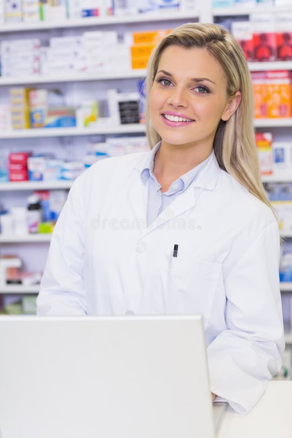 Smiling Pharmaacist Looking at Camera Stock Photo - Image of technology ...