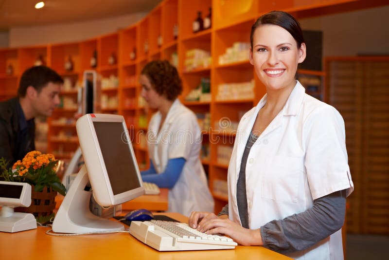 Smiling Pharmacist at Computer Stock Photo - Image of ordering, order ...