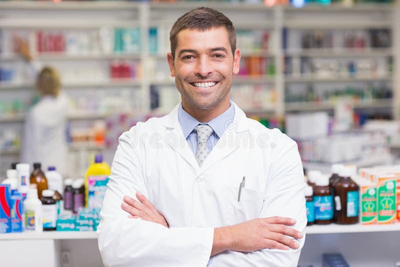 Smiling Pharmacist in Lab Coat Looking at Camera Stock Image - Image of ...