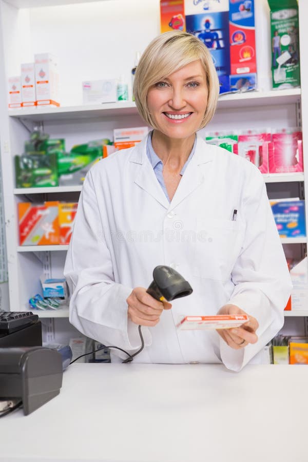 Pharmacist Scanning Medication with a Scanner Stock Image - Image of ...