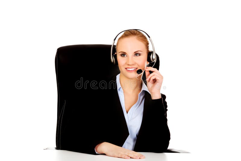 Smiling Phone Operator in Headphones Sitting Behind the Desk Stock ...