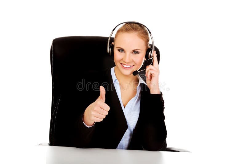 Smiling Phone Operator in Headphones Sitting Behind the Desk Stock ...