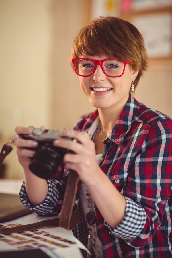 Smiling Photographer Looking at Camera Stock Photo - Image of digital ...