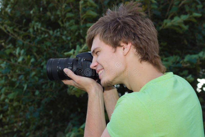 Smiling photographer stock image. Image of smiling, photographer - 60045465