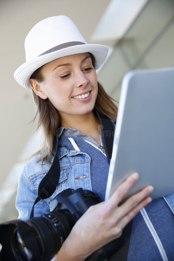 Smiling Photographer at Work Using Tablet Stock Photo - Image of ...