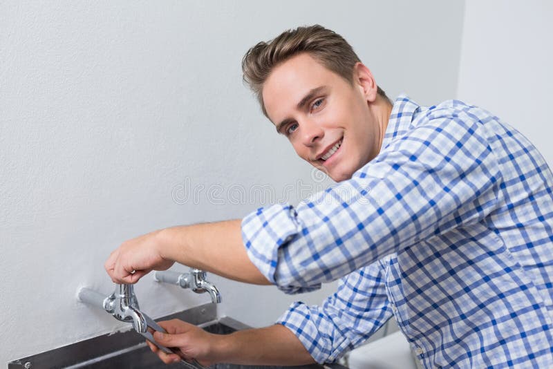 Plumber Fixing Toilet in a Washroom with Silicone Cartridge Stock Image ...