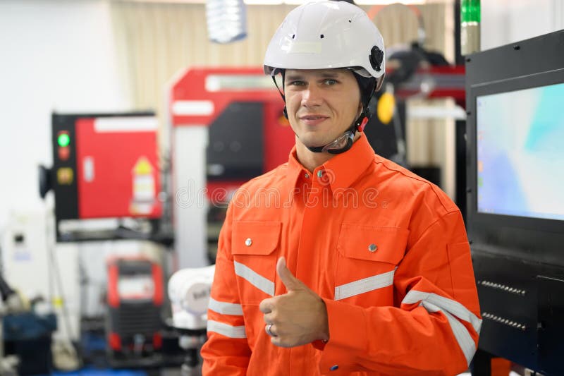 Smiling Portrait of Professional Engineer Posing and Looking at Camera ...