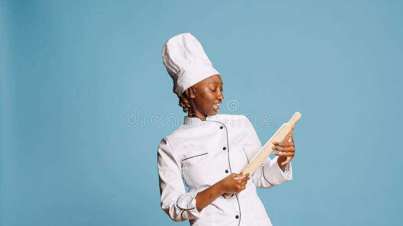 Smiling Positive Cook Playing with Rolling Pin and Singing Stock Image ...