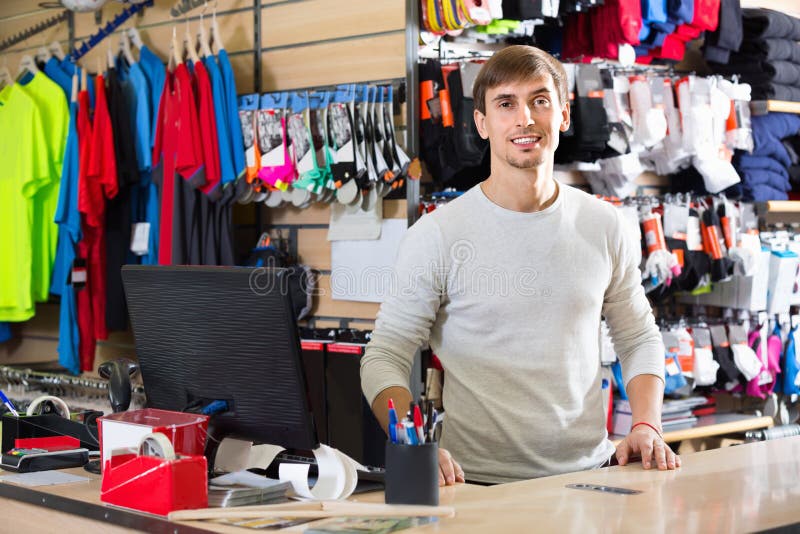 Smiling Positive Man Cashier at the Pay Desk Stock Photo - Image of ...