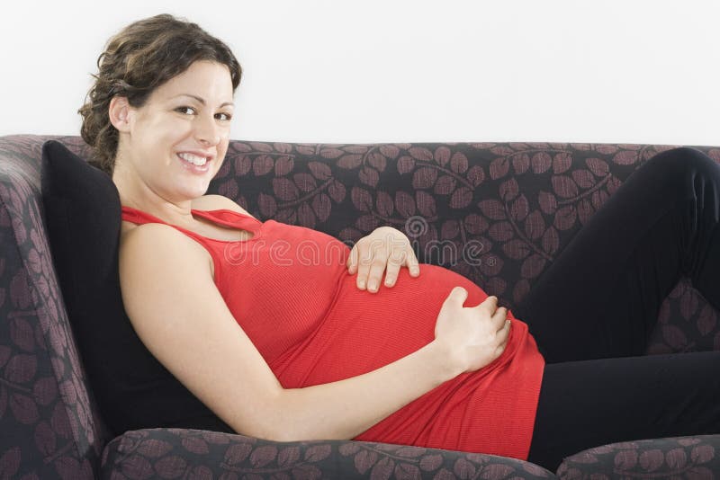 Smiling Pregnant Woman Relaxing On Sofa Stock Image Image Of House