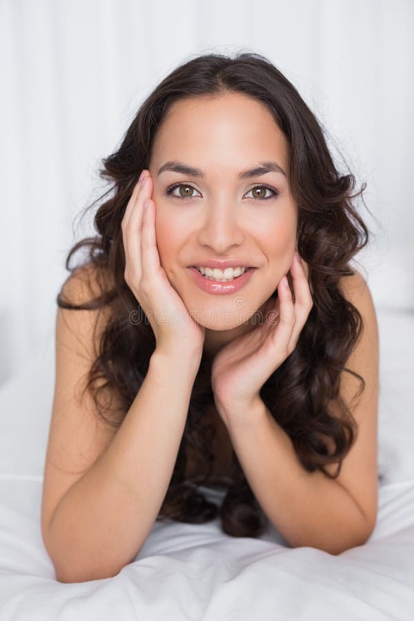 Smiling Pretty Brunette Lying in Bed Stock Image - Image of camera ...