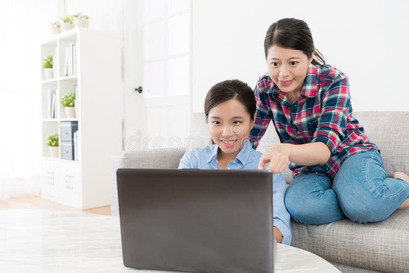 Smiling Pretty Female Friends Using Mobile Computer Stock Image - Image ...