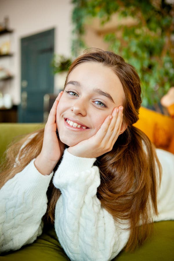 Smiling Pretty Girl is Lying on the Couch Stock Photo - Image of female ...