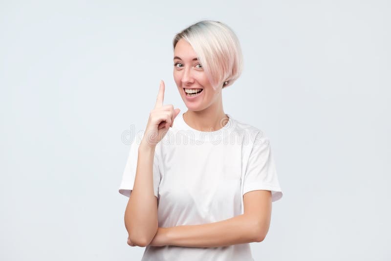 Smiling Pretty Girl Pointing Index Finger Up Giving Advice Stock Photo ... Smiling Pretty Girl Pointing Index Finger Up Giving Advice Stock Photo ...
