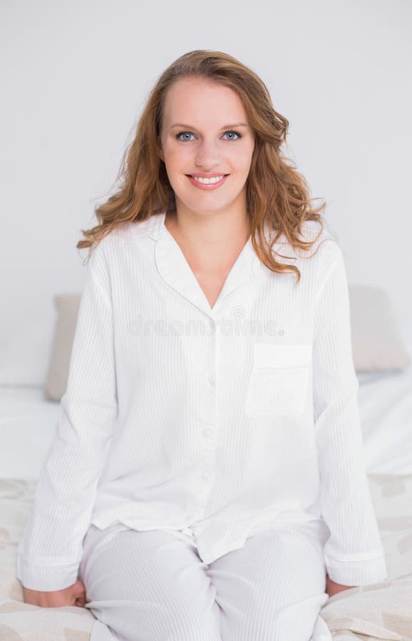 Smiling Pretty Woman Sitting on Her Bed Stock Image - Image of ...