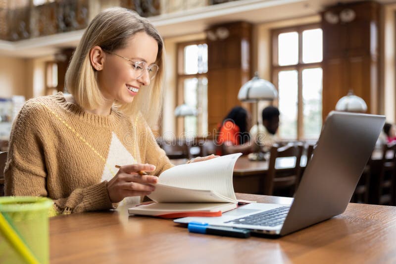 Smiling Pretty Woman Working in the Library Stock Photo - Image of ...