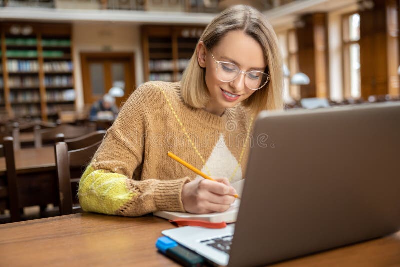 Smiling Pretty Woman Working in the Library Stock Image - Image of cute ...