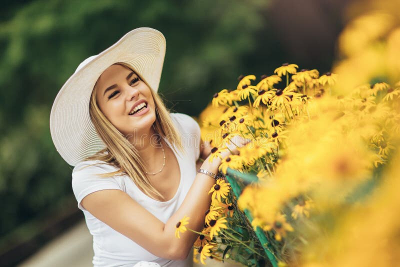 Smiling Pretty Young Woman with Spring Flowers Stock Photo - Image of ...