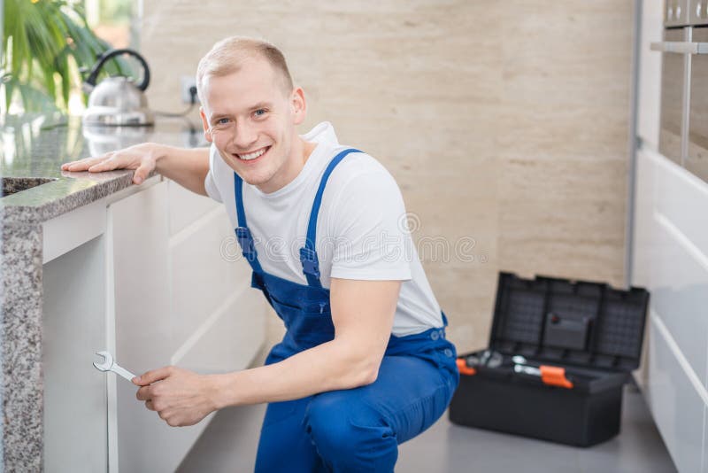Professional Plumber Repairing a Tap Stock Image - Image of ...