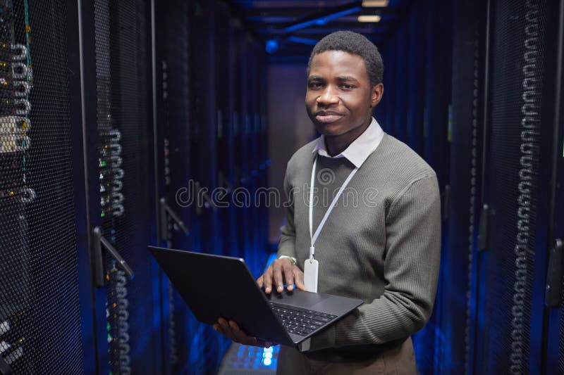 Smiling it Professional in Server Room with Laptop Stock Image - Image ...