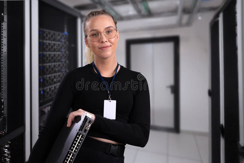 Smiling Professional Technician Holding Network Equipment in a Modern ...