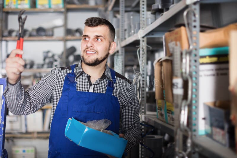 Professional Worker Man Showing Various Tools Stock Photo - Image of ...