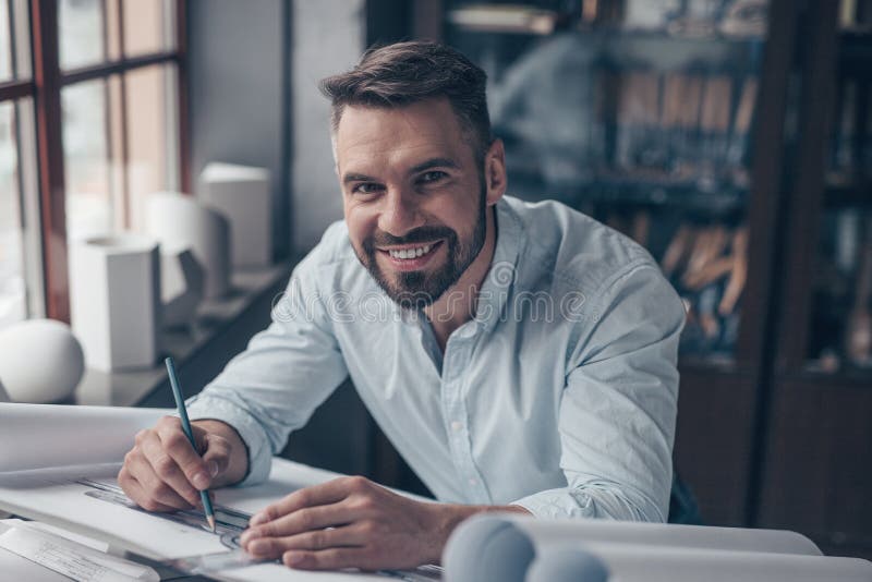 Smiling Professional in the Workplace Stock Image - Image of design ...