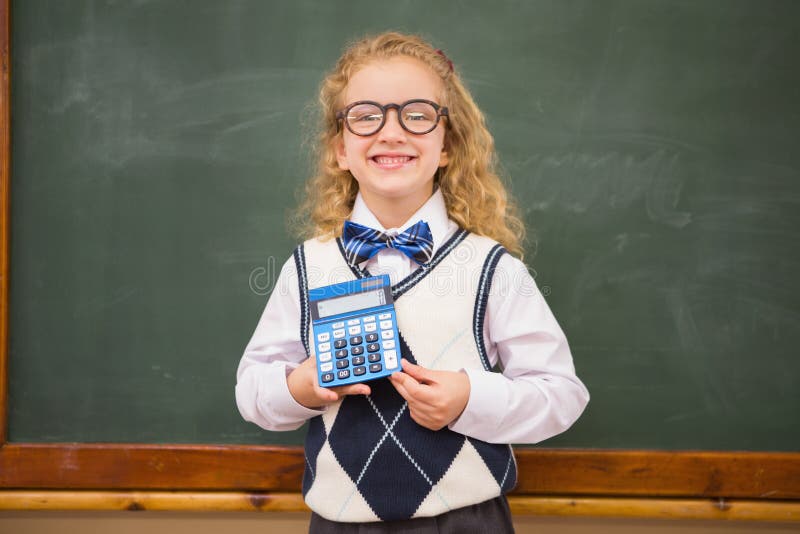 Smiling Pupil Holding Calculator Stock Image - Image of learn ...