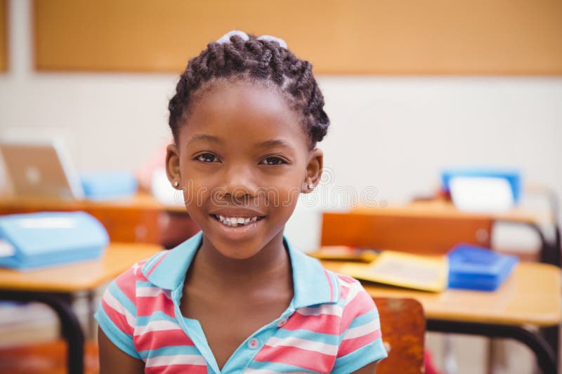 African American Girl Student Smiling while Sitting at School Desk with ...