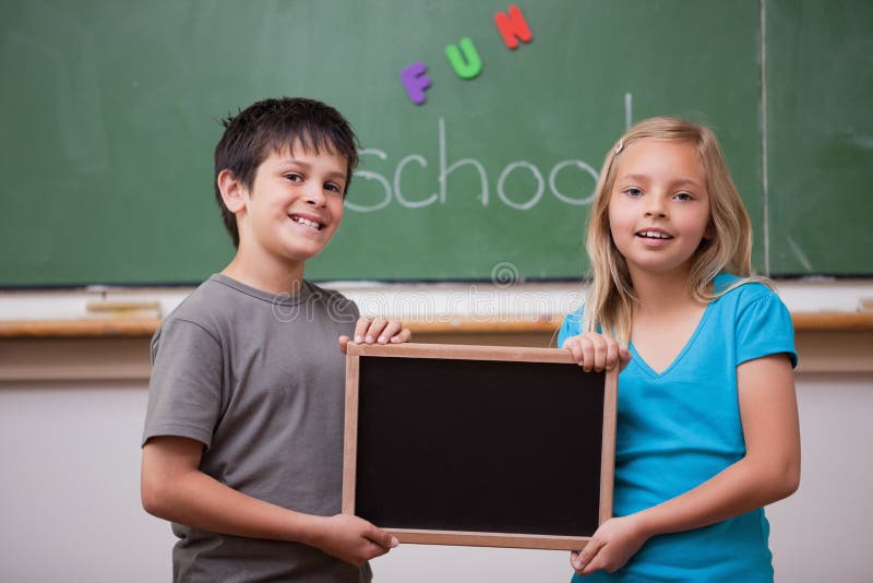 Smiling Pupils Holding a School Slate Stock Photo - Image of learn ...