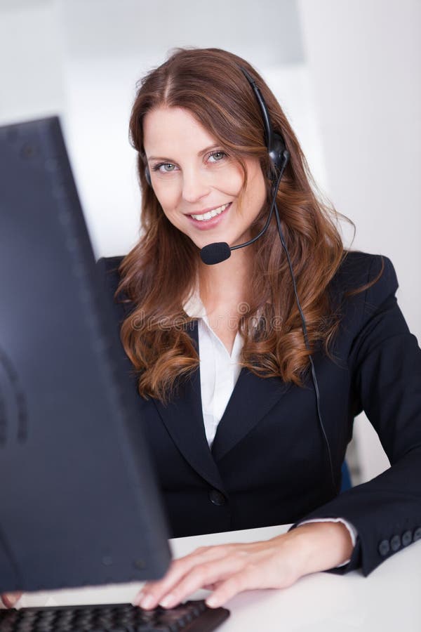 Smiling Receptionist or Call Centre Worker Stock Image - Image of ...