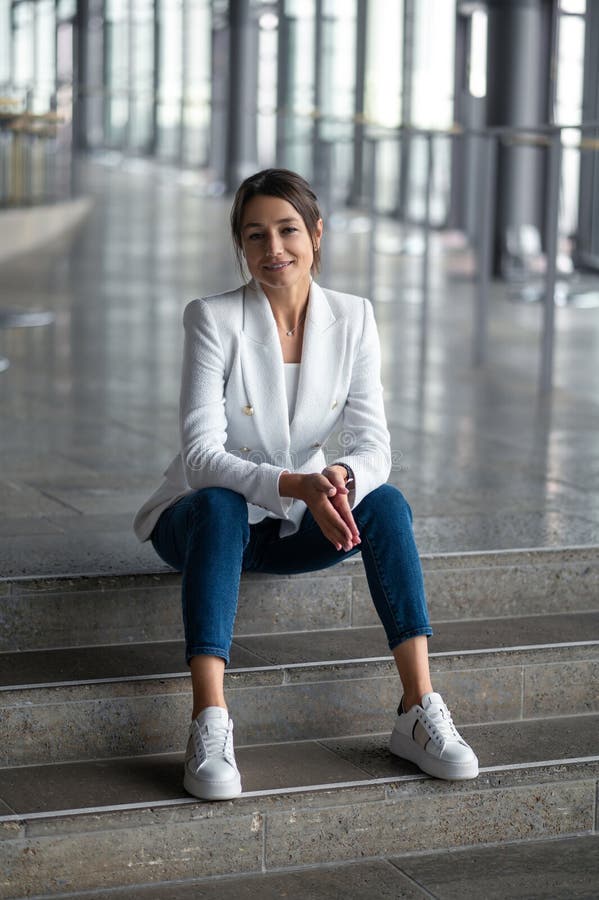 Smiling Relaxed Pretty Woman Sitting on the Steps Stock Photo - Image ...