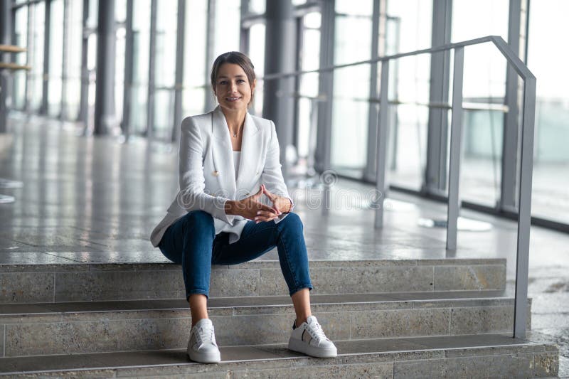 Smiling Relaxed Pretty Woman Sitting on the Steps Stock Photo - Image ...